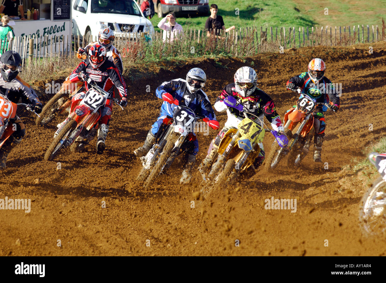 a guy rider on a motocross bile motorcycle jumping and racing big air ...