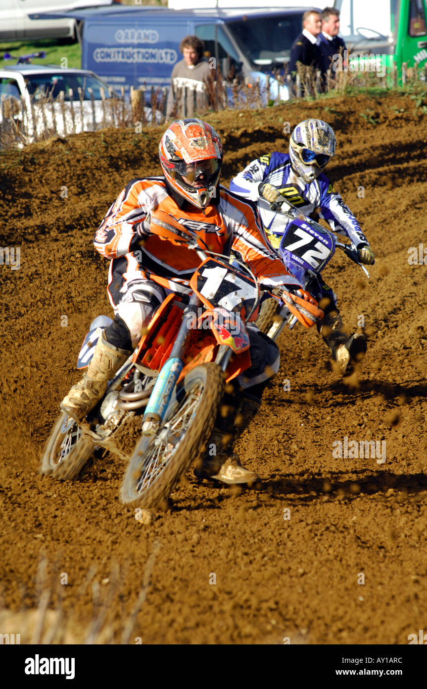 a guy rider on a motocross bile motorcycle jumping and racing big air ...