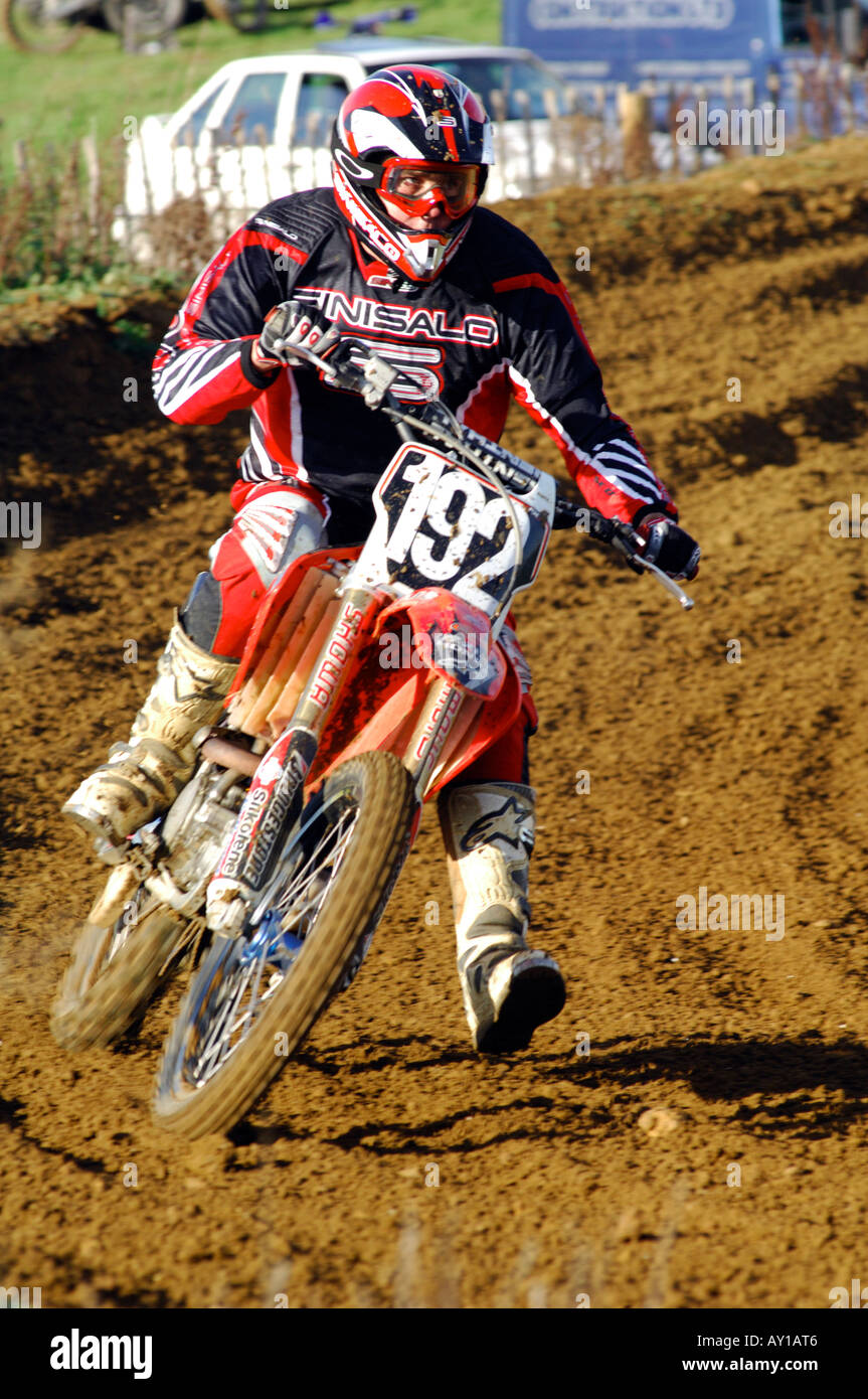 a guy rider on a motocross bile motorcycle jumping and racing big air ...