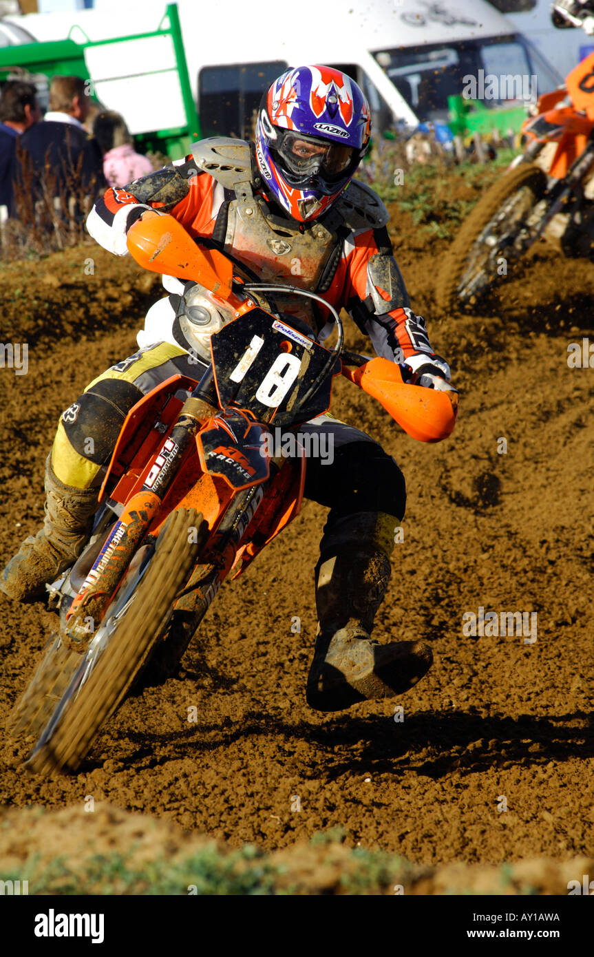 a guy rider on a motocross bile motorcycle jumping and racing big air ...