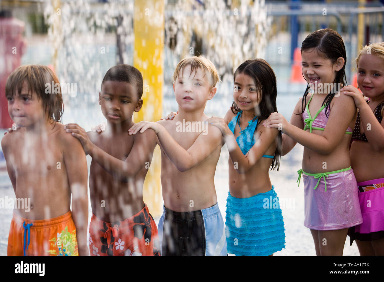 Children playing in water park Stock Photo - Alamy
