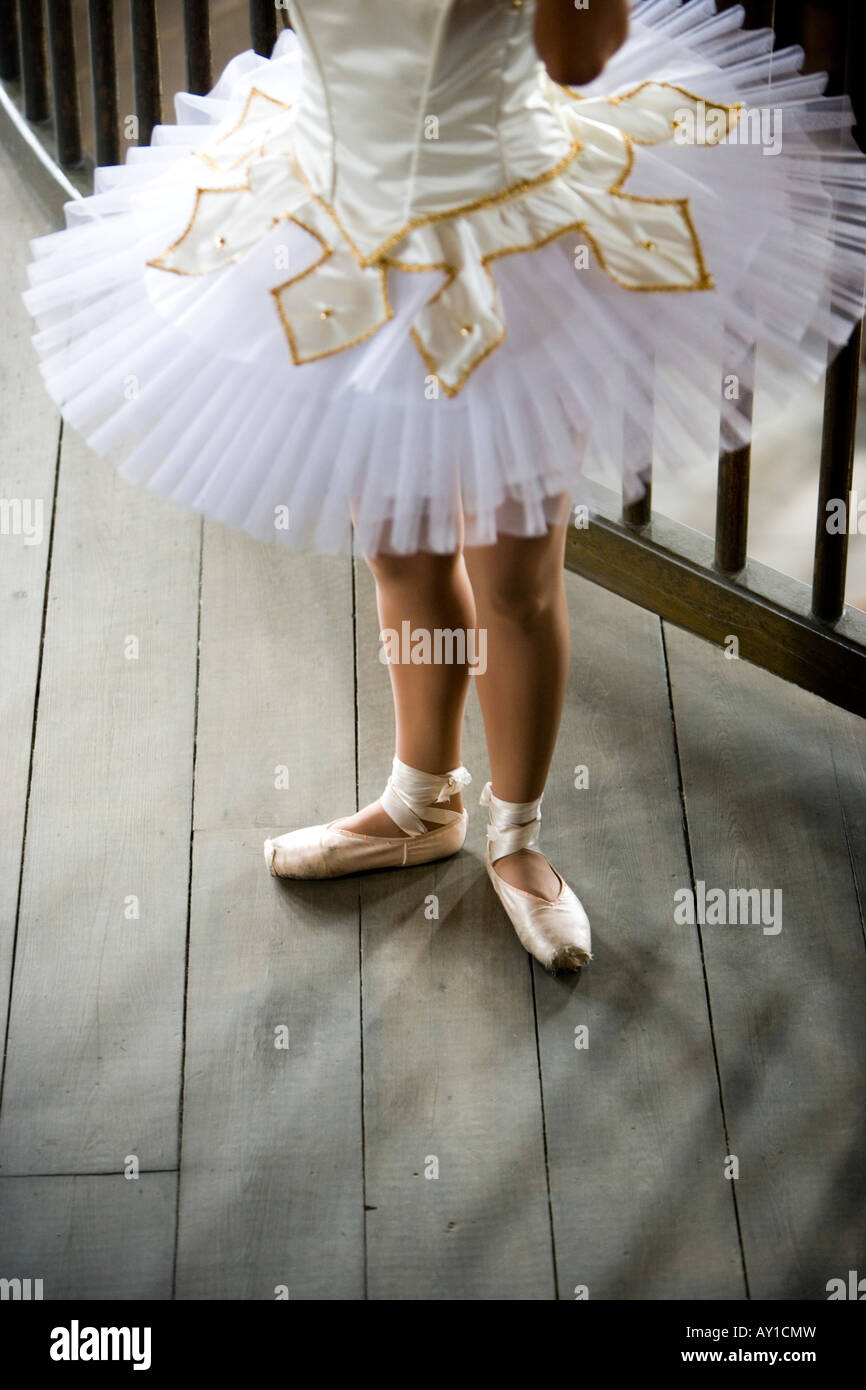 Low section of a ballet dancer standing Stock Photo - Alamy