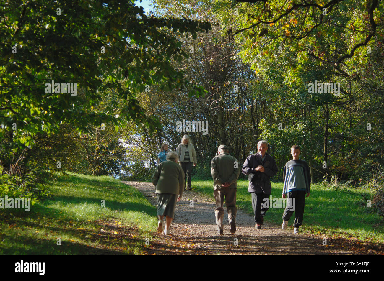 People Walking On A Country Path Stock Photo - Alamy