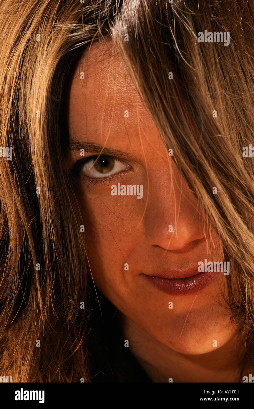 Portrait of woman in studio Stock Photo - Alamy