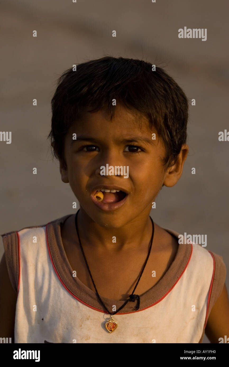 Indian poor child eating food hi-res stock photography and images - Alamy