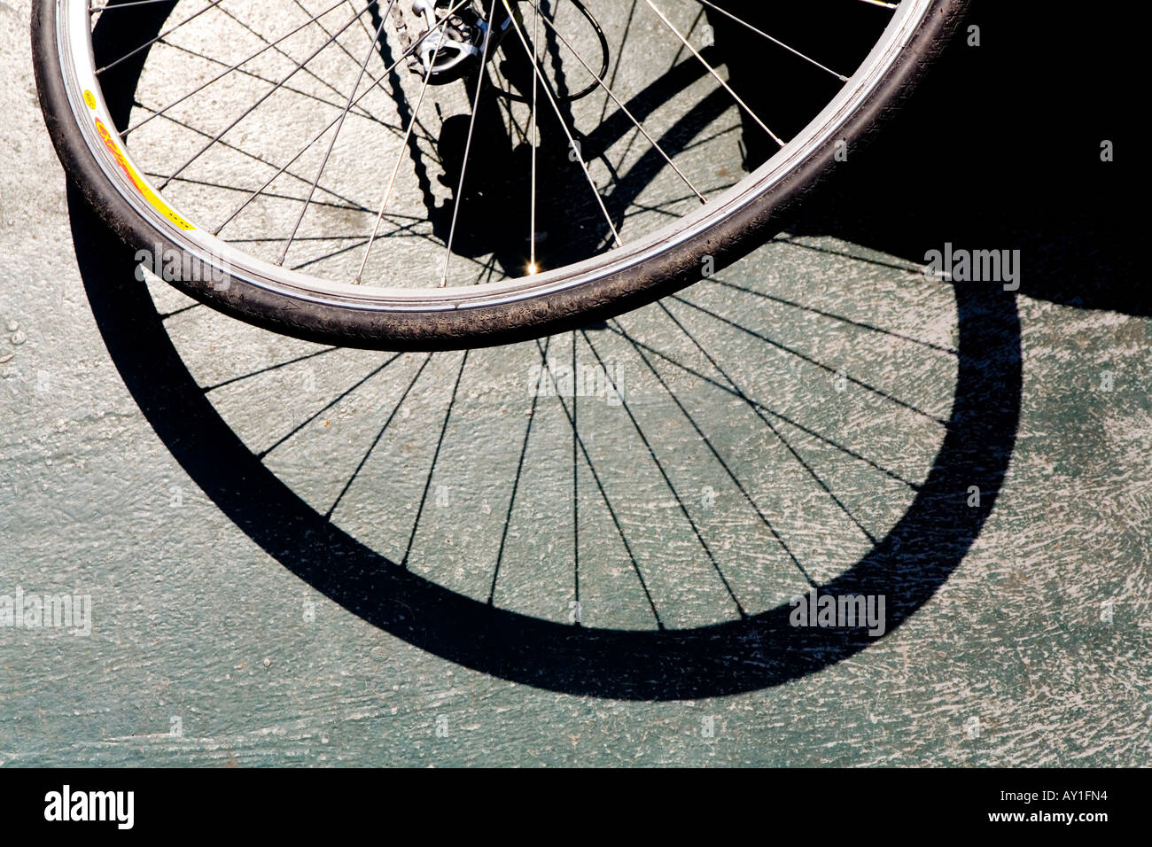 bike wheel and shadow Stock Photo - Alamy