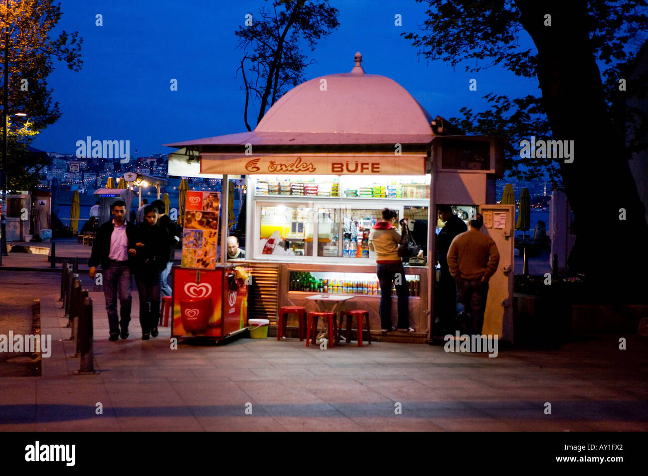 People at a stall at night in Istanbul, Turkey Stock Photo - Alamy