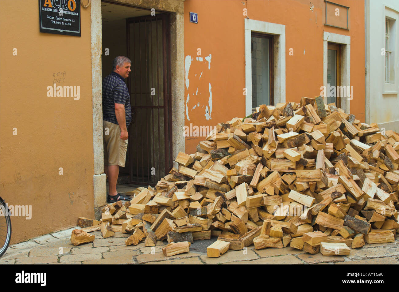 Pile of split log firewood in front of house just after delivery Stock ...