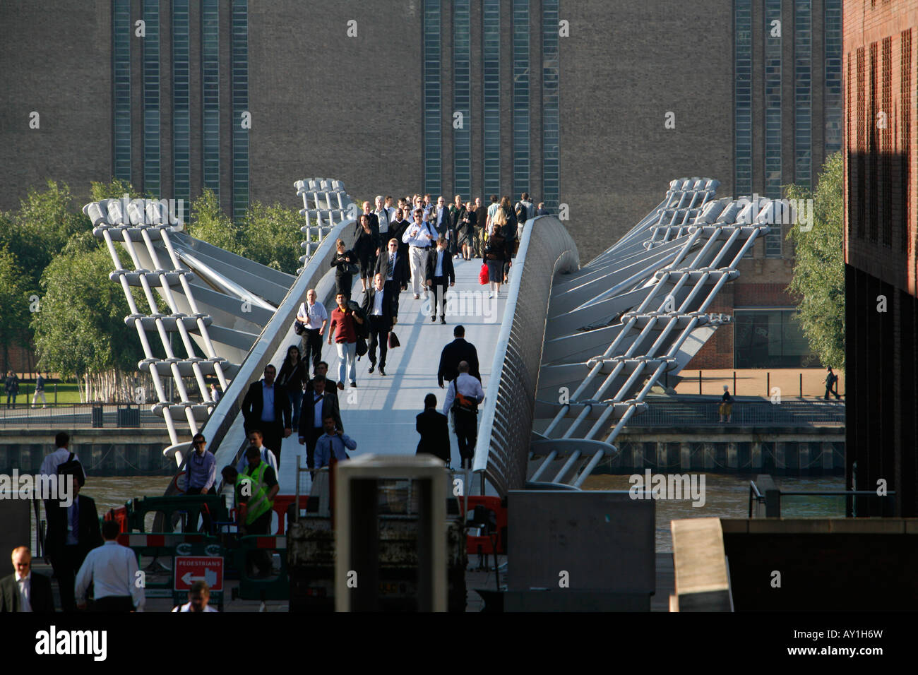Commuters walking over Millennium Bridge, Bankside, London Stock Photo ...