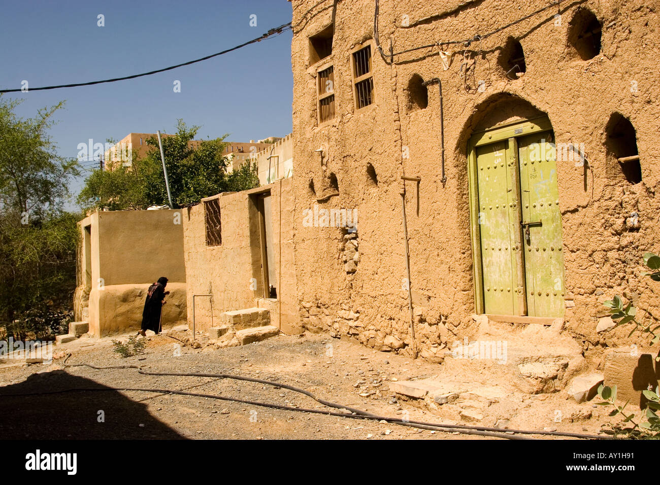 Mud brick houses at Al Hamra village one of the oldest villages in Oman ...
