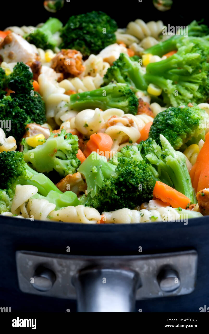 Cooking vegetables in a pan Stock Photo - Alamy