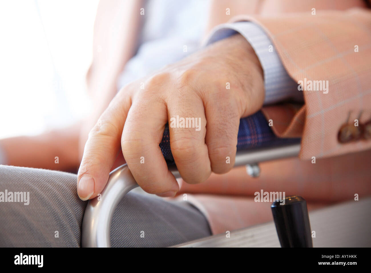 Hand gripping a handrail Stock Photo - Alamy