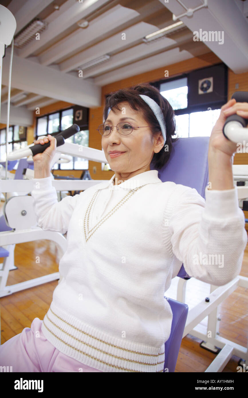 Old lady doing exercise Stock Photo - Alamy