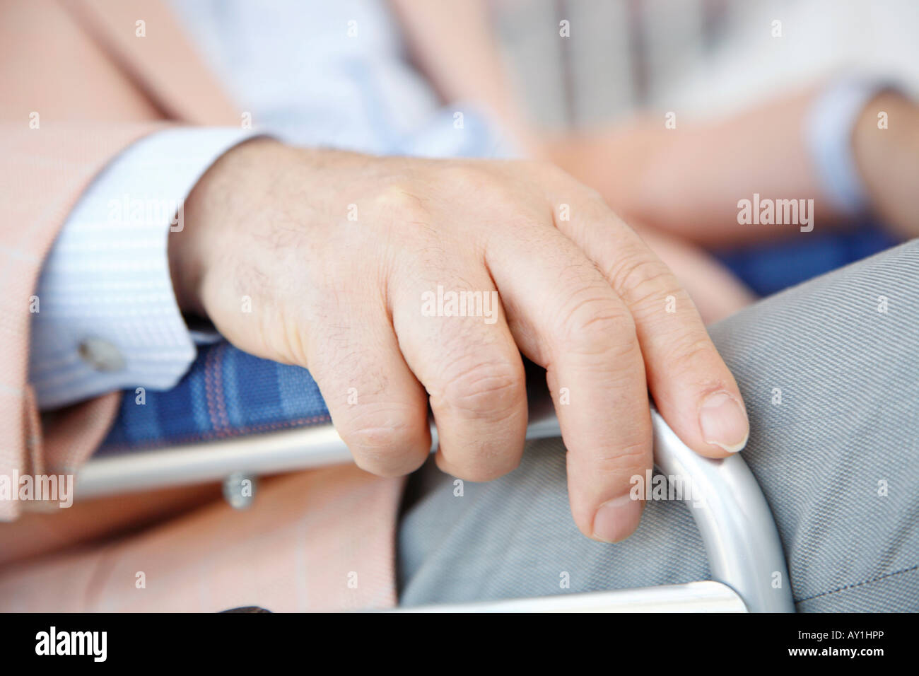 Hand gripping a handrail Stock Photo - Alamy