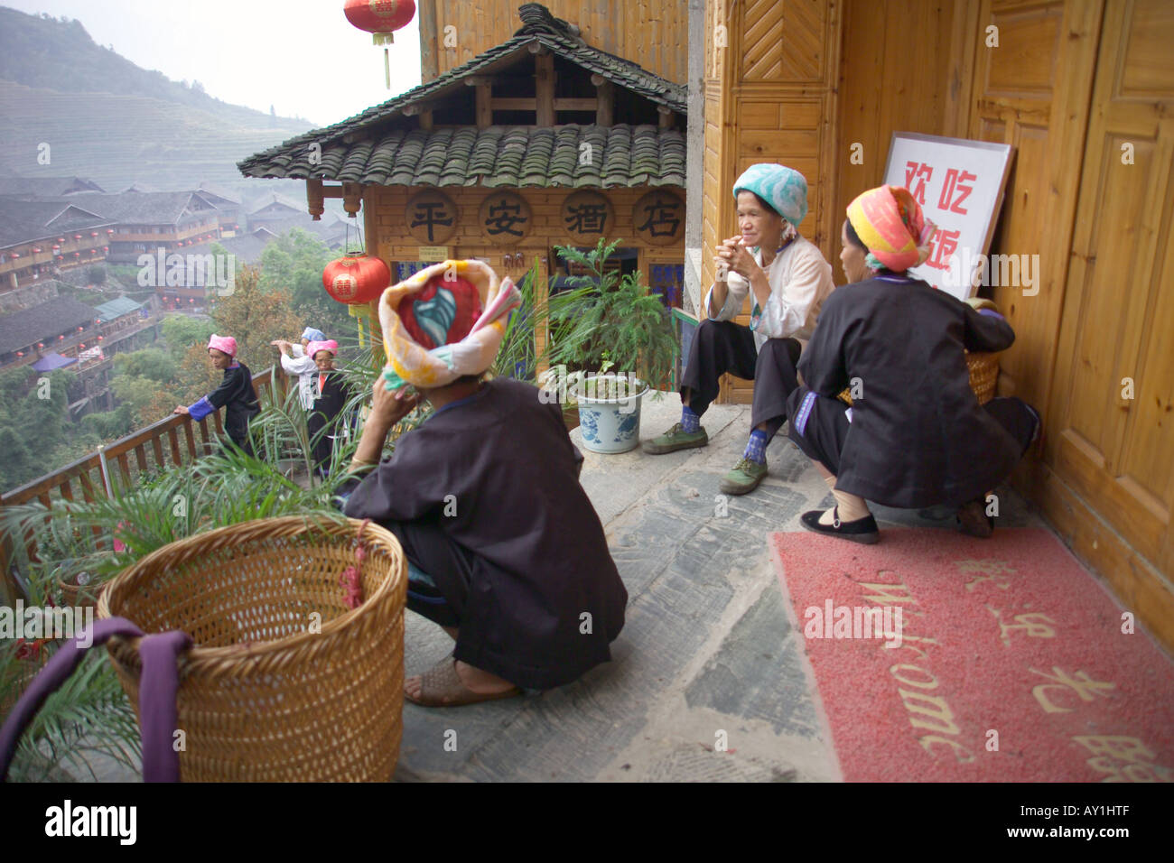 Chinese women in local dress Stock Photo - Alamy