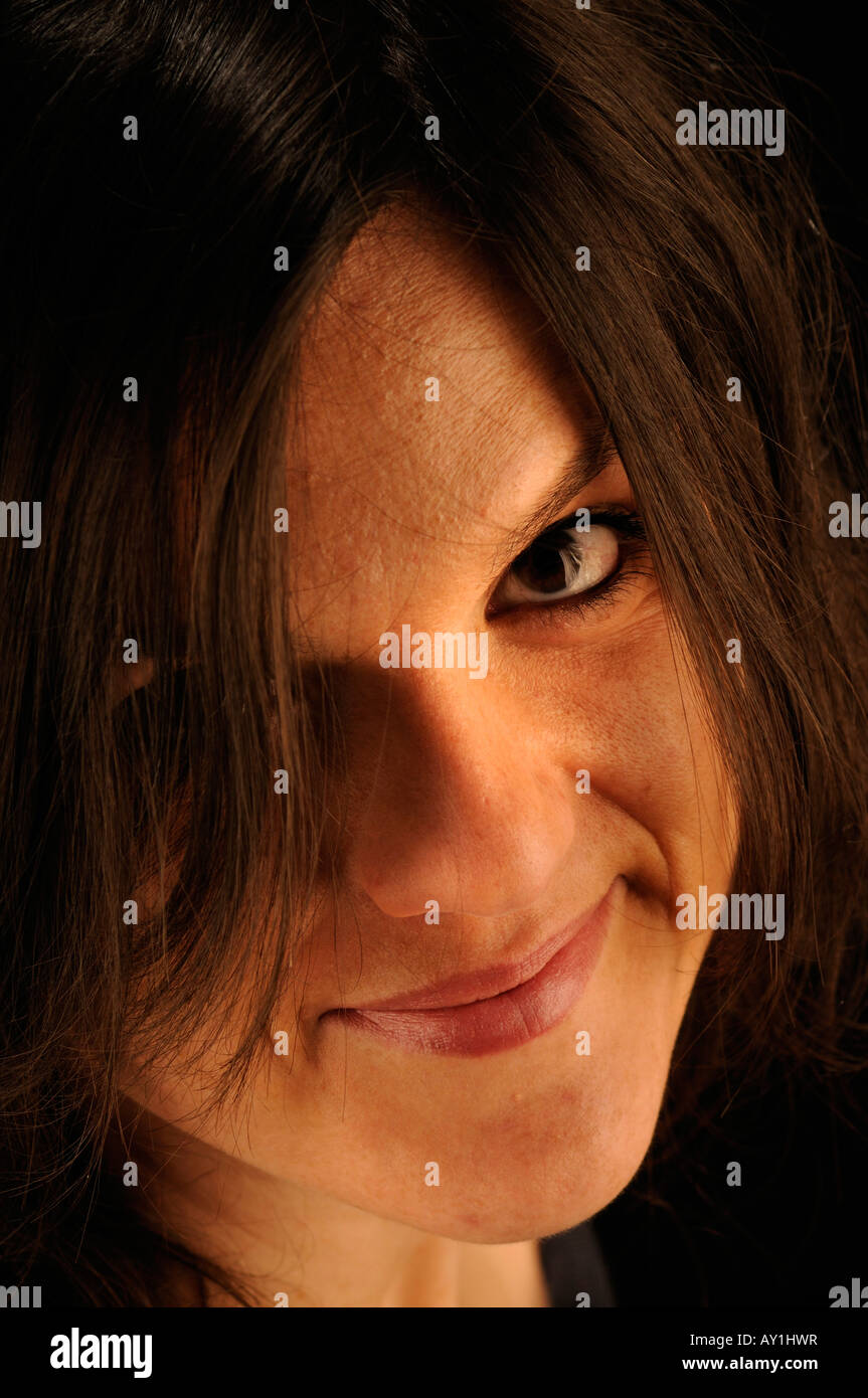 Portrait of woman in studio Stock Photo - Alamy