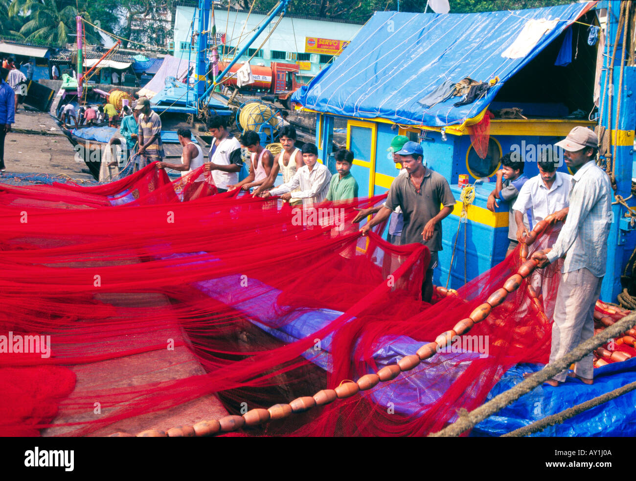 Kolhi Fishermen with nets at Sassoon (Sassun) Docks Colaba the main ...
