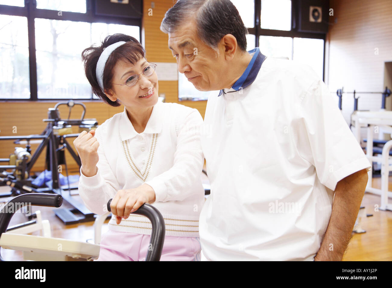 Old lady doing exercise Stock Photo - Alamy