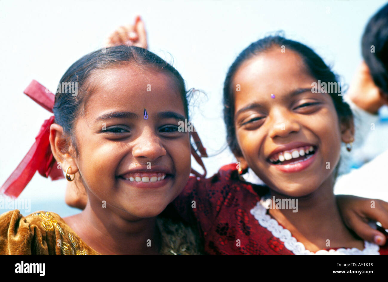 Two happy little Indian girls from Mumbai's indigenous Kohli community ...