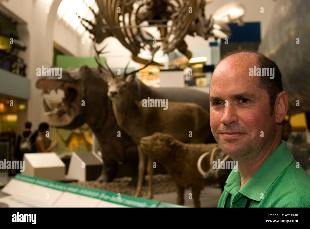 Blind man with his guide dog inside Natural History Museum where he ...