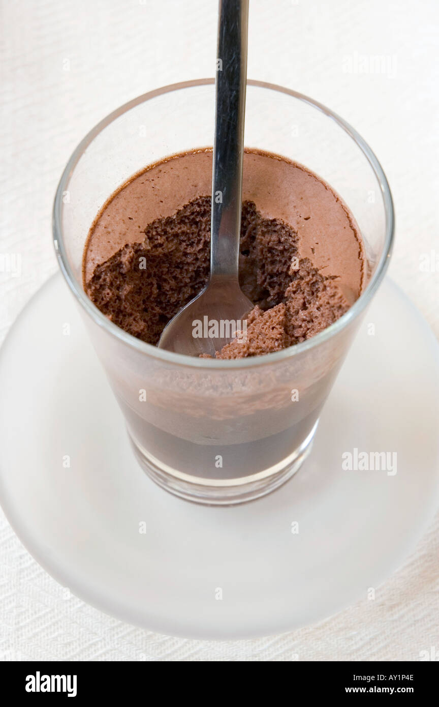 Spoon in chocolate moccha mousse dessert in glass tumbler Stock Photo ...