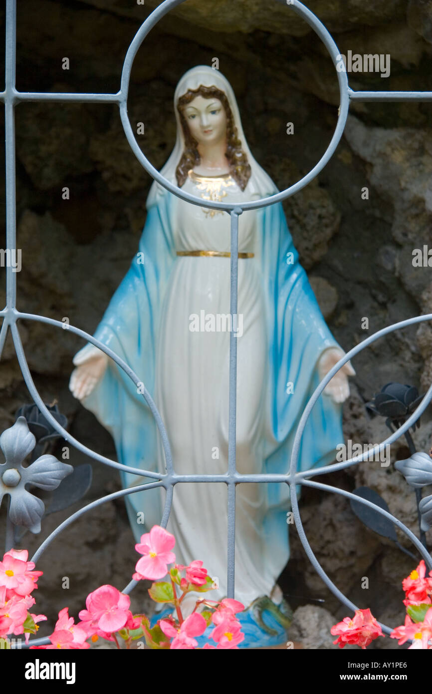 Madonna with flowers hi-res stock photography and images - Alamy