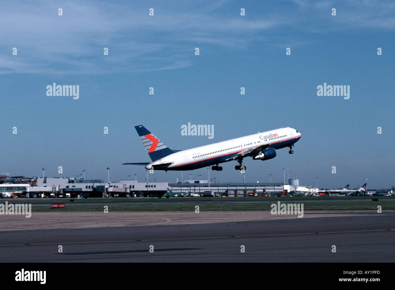 Aircraft taking off from airport Stock Photo - Alamy