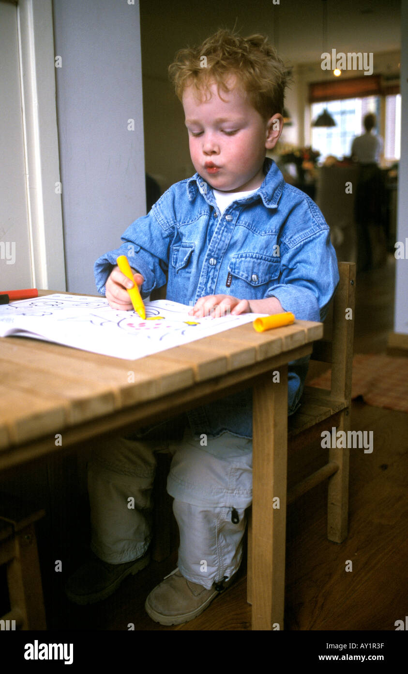 Little boy is making a drawing Stock Photo - Alamy
