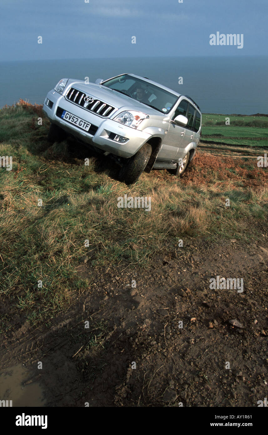 Off road car on muddy track Stock Photo - Alamy