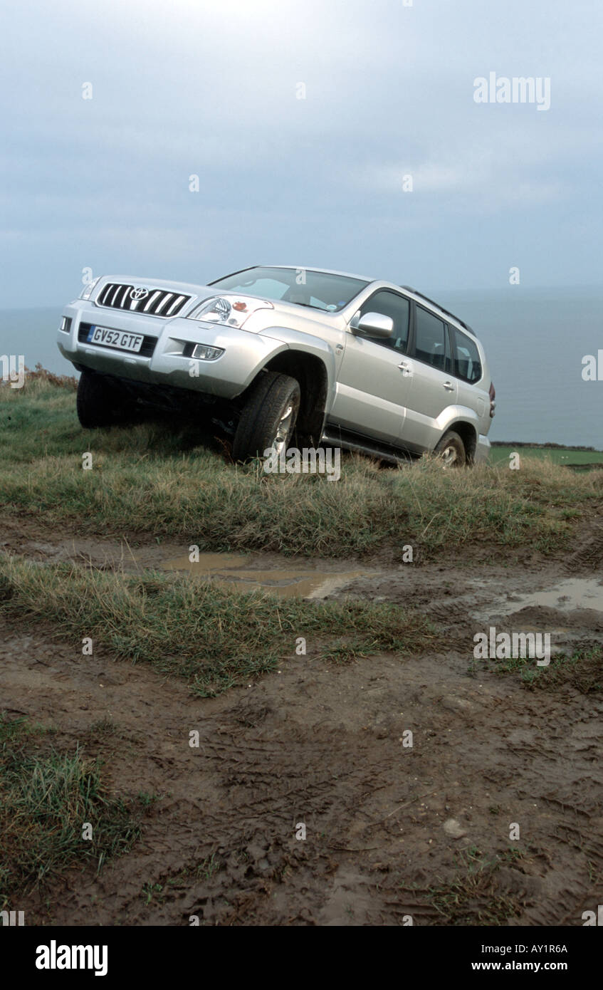 Off road car on muddy track Stock Photo - Alamy