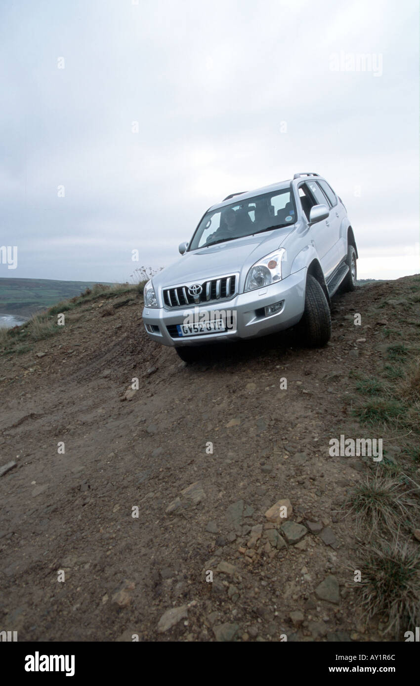 Off road car on muddy track Stock Photo - Alamy