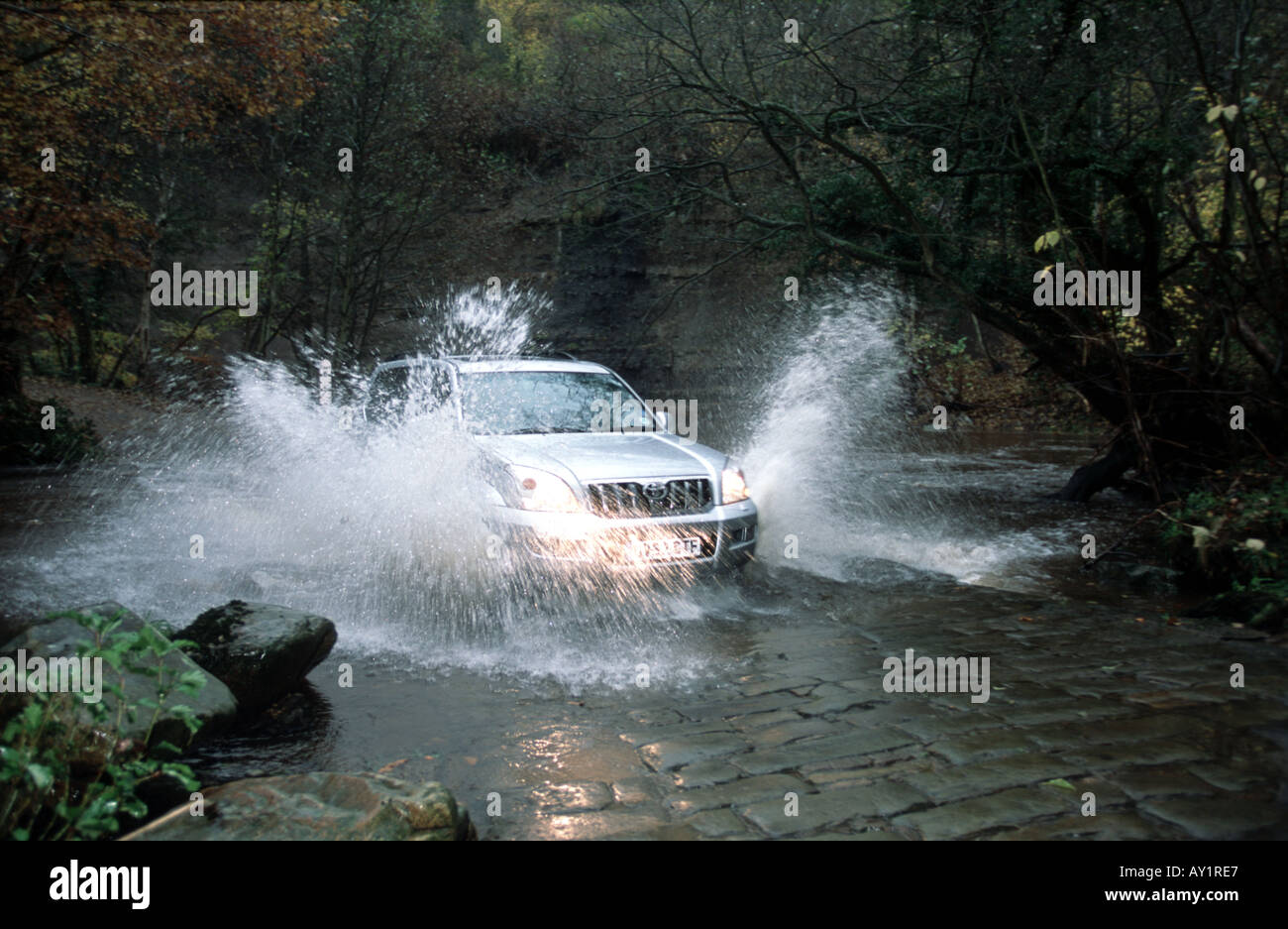 Driving through stream ford hi-res stock photography and images - Alamy