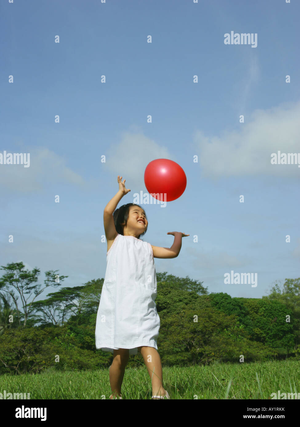 Girl reaching balloon hi-res stock photography and images - Alamy