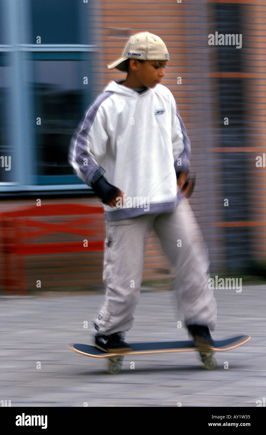 Ethnic boy on a skateboard Stock Photo - Alamy