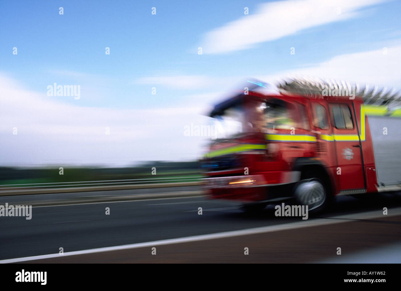 Fire engine speeding along a motorway in England UK Stock Photo - Alamy