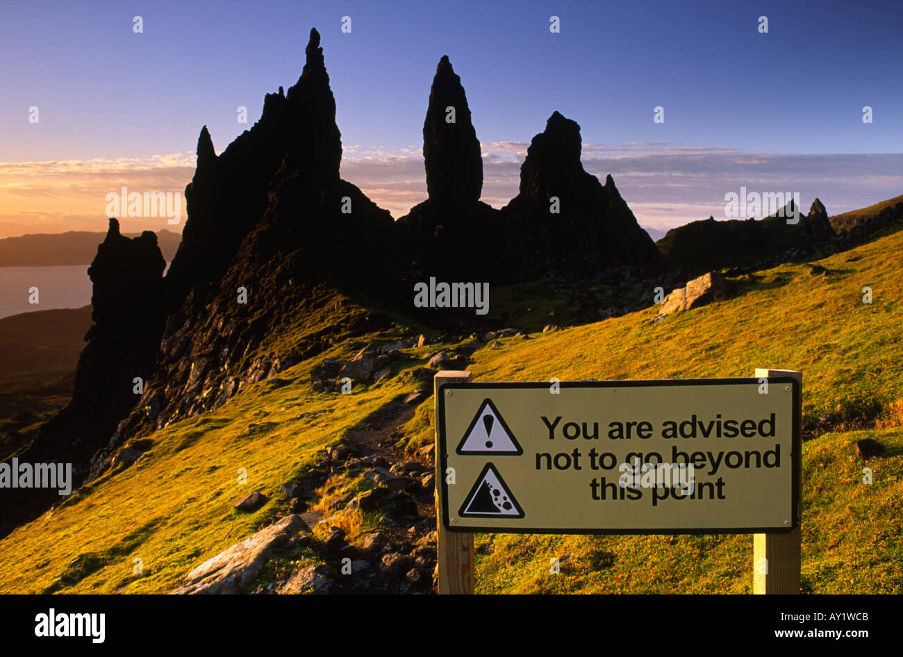 Rockfall warning sign along a path leading to the Old Man of Storr on ...