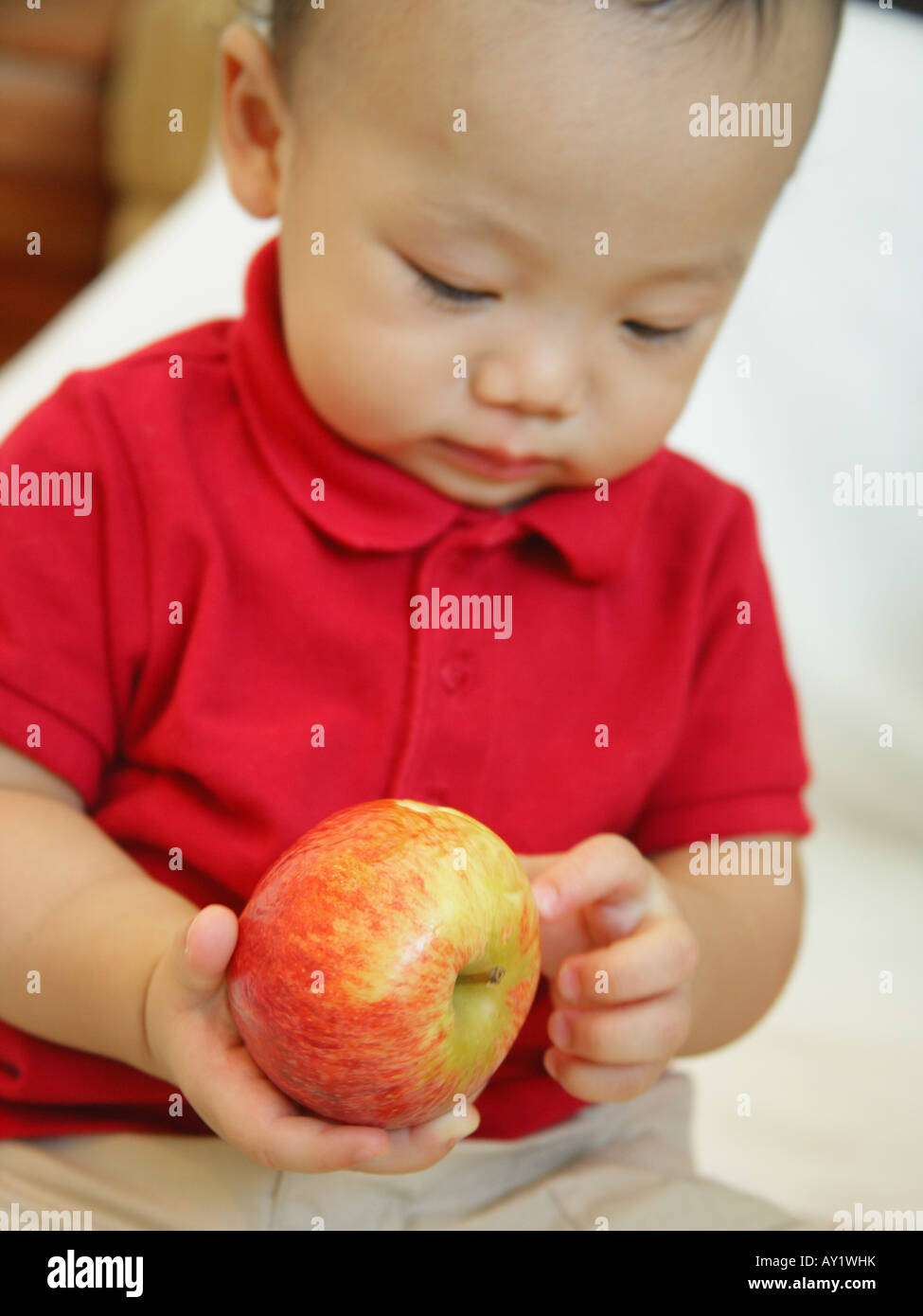 Cute baby boy apple fruit hi-res stock photography and images - Alamy