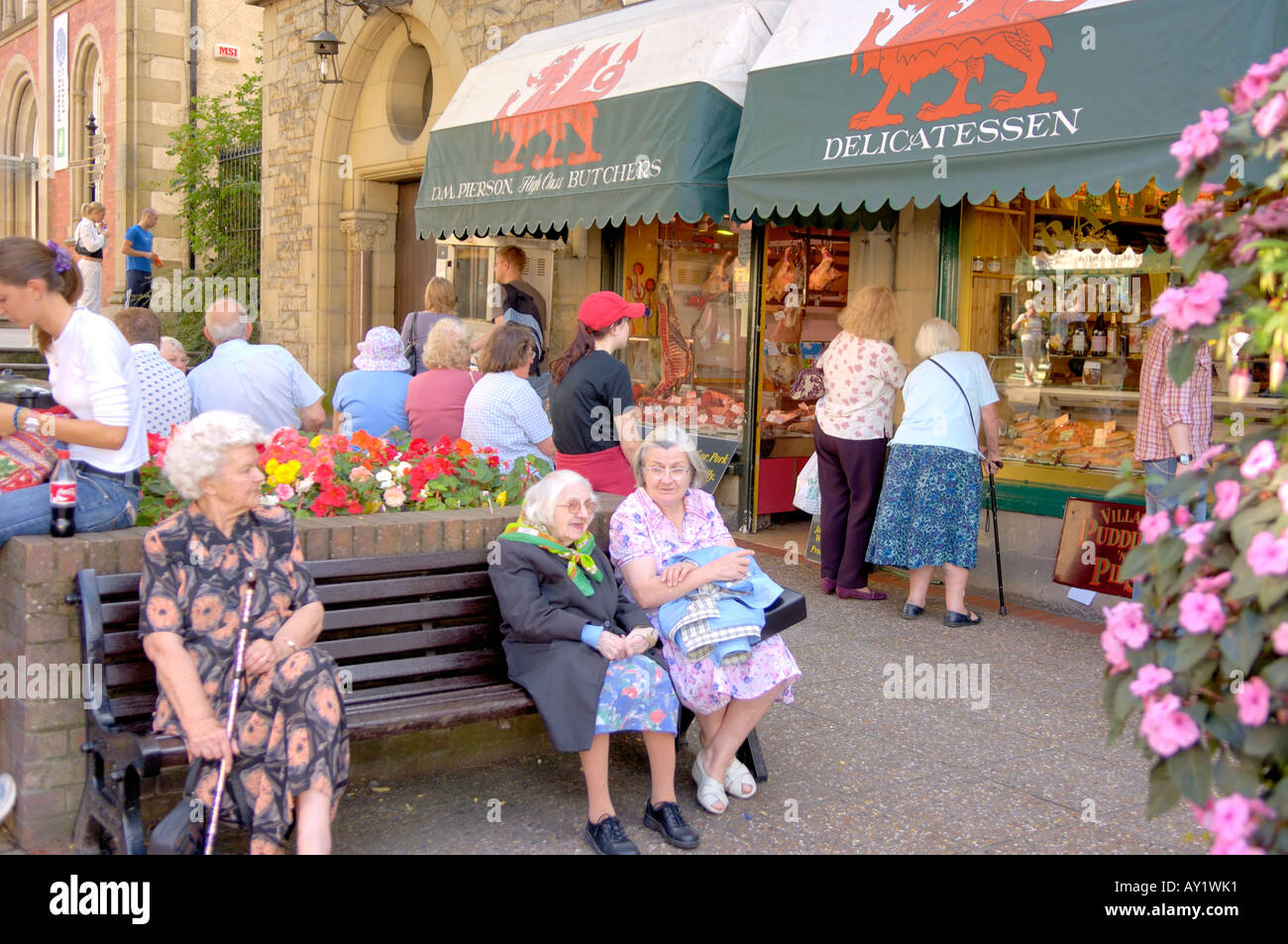 Ladies Sat Outside Butchers and Delicatessen Shop Llangollen North East ...