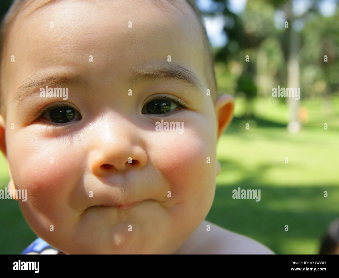Portrait of a baby boy smiling Stock Photo - Alamy