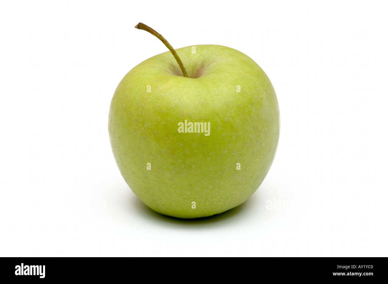 Green golden delicious apple on white background Stock Photo - Alamy
