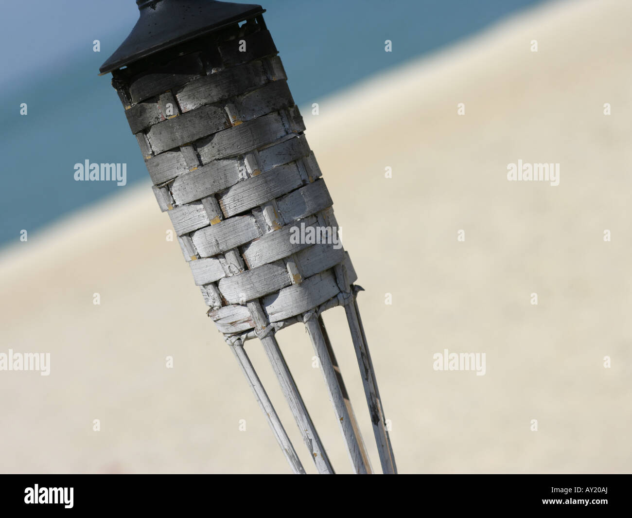 Tiki torch on beach hi-res stock photography and images - Alamy