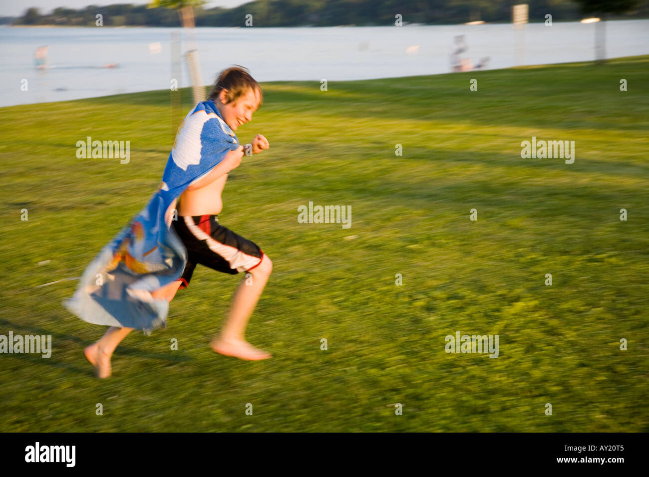Boy with towel cape hi-res stock photography and images - Alamy