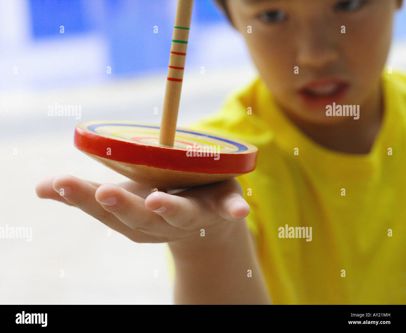 Boy playing spinning top hi-res stock photography and images - Alamy