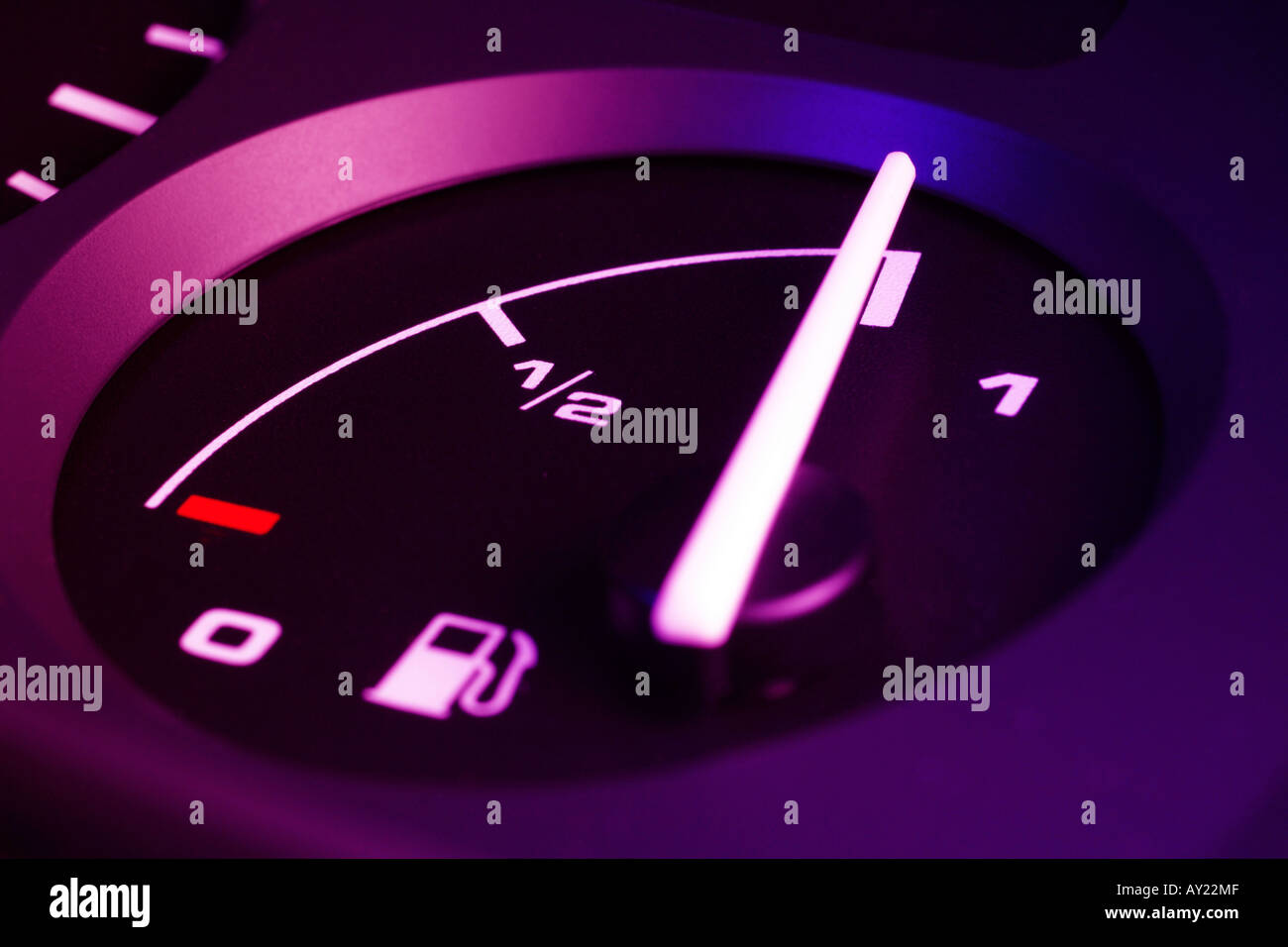 Fuel gauge on car dashboard showing full Stock Photo - Alamy
