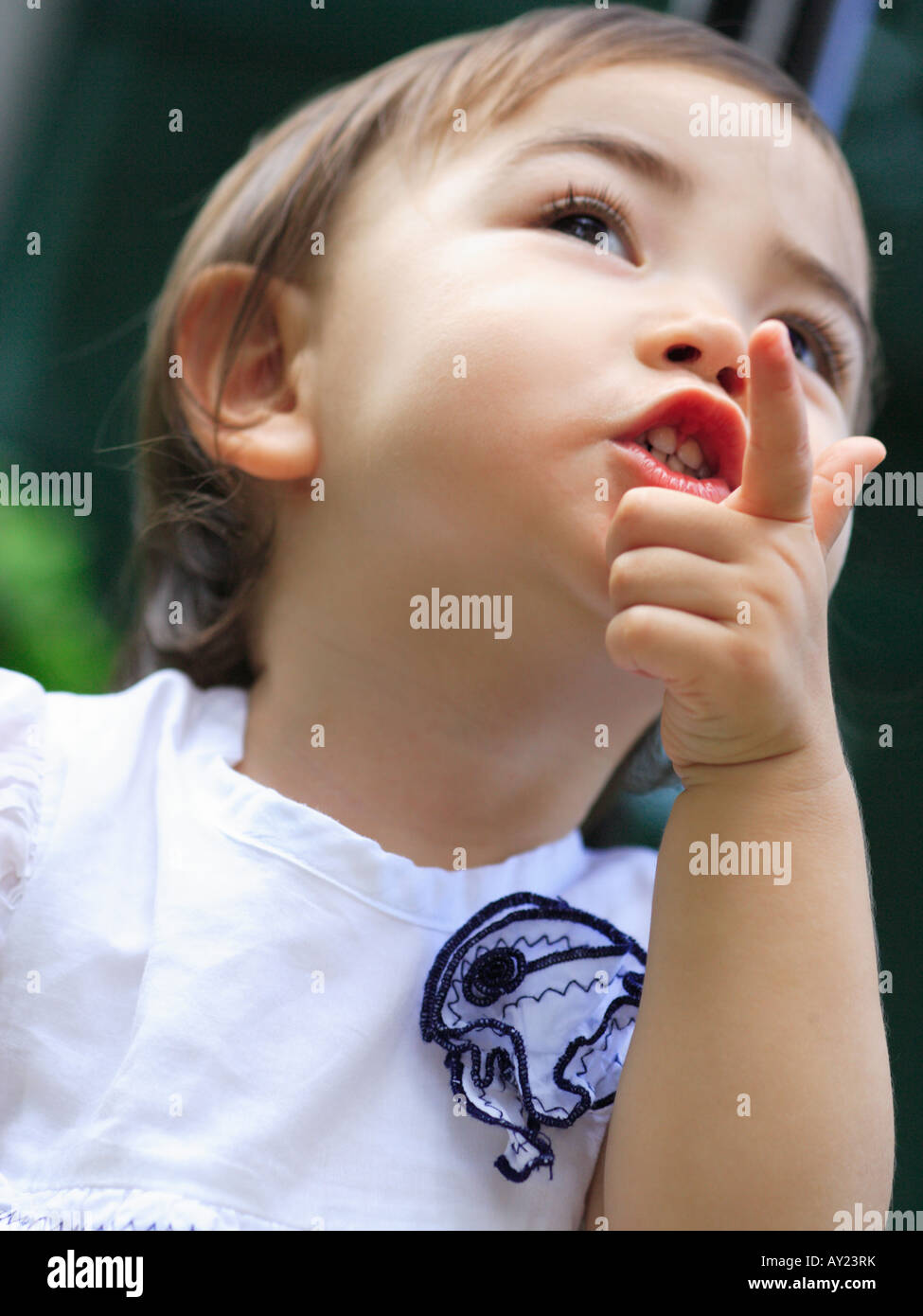 Adorable girl pointing one hi-res stock photography and images - Alamy