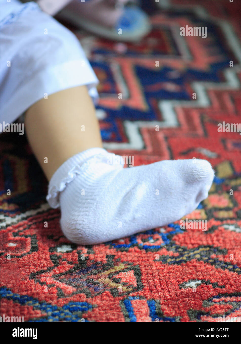 Low section view of a baby lying down Stock Photo - Alamy