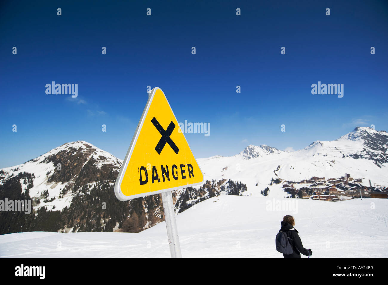 yellow triangle danger sign with female figure Stock Photo - Alamy