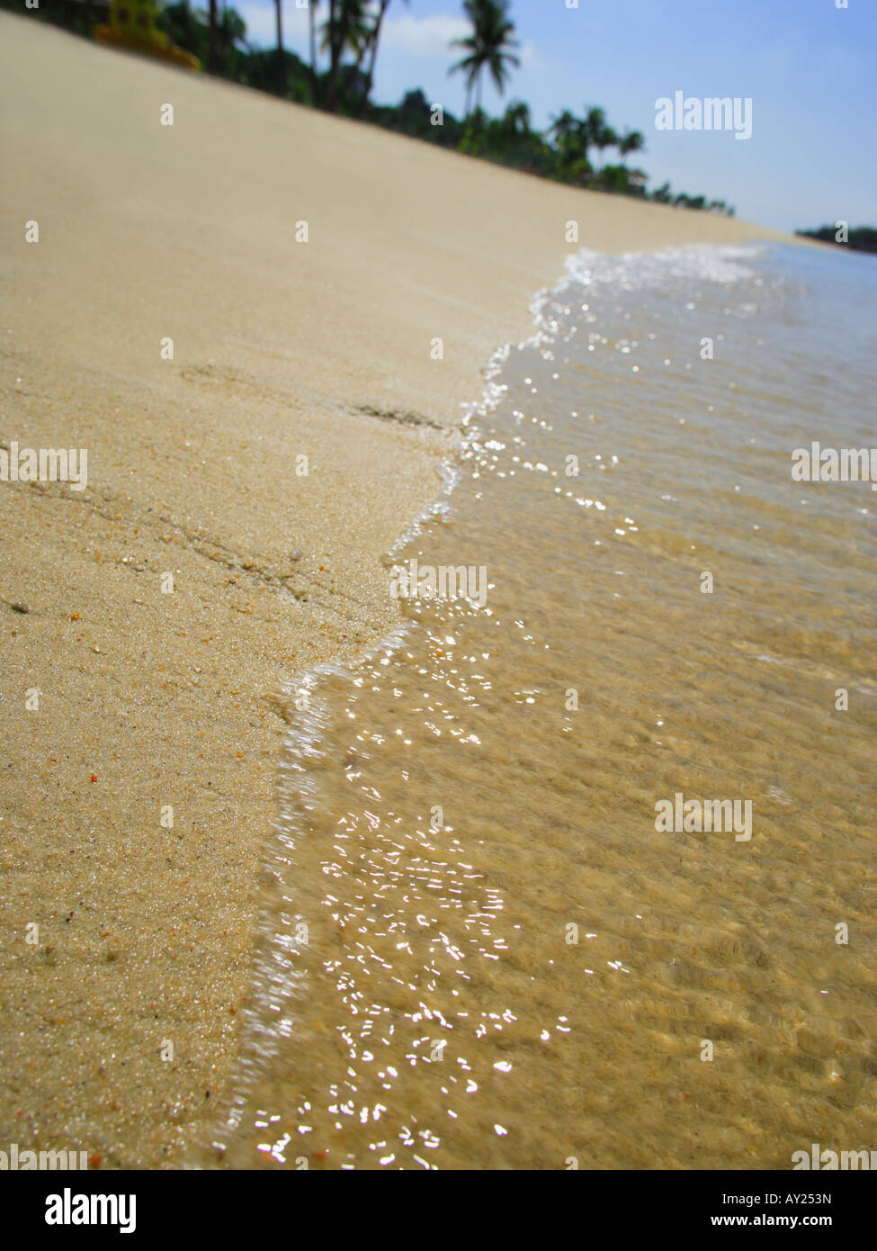 Tide on the beach Stock Photo - Alamy