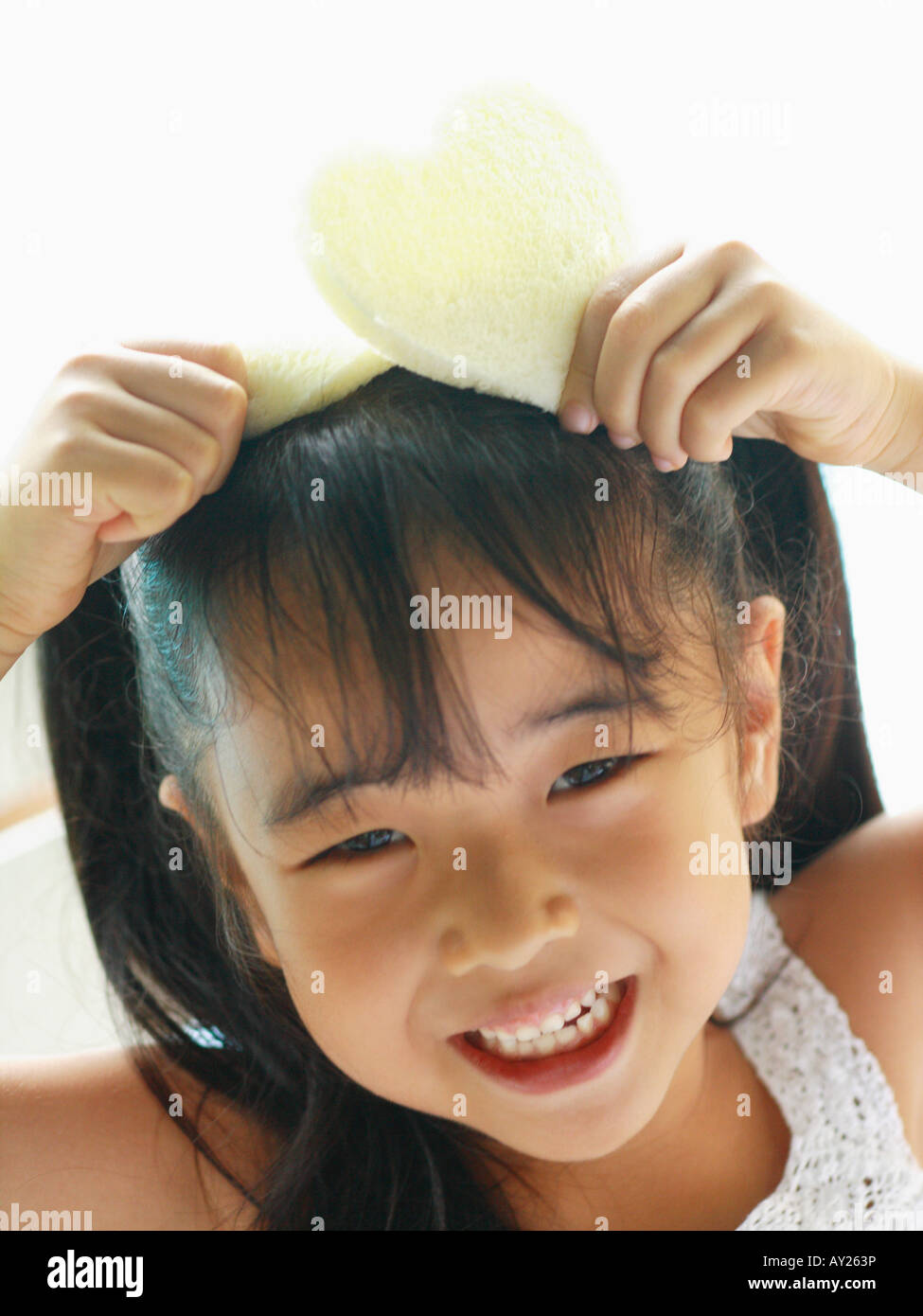 Girl smiling camera looking over hi-res stock photography and images ...