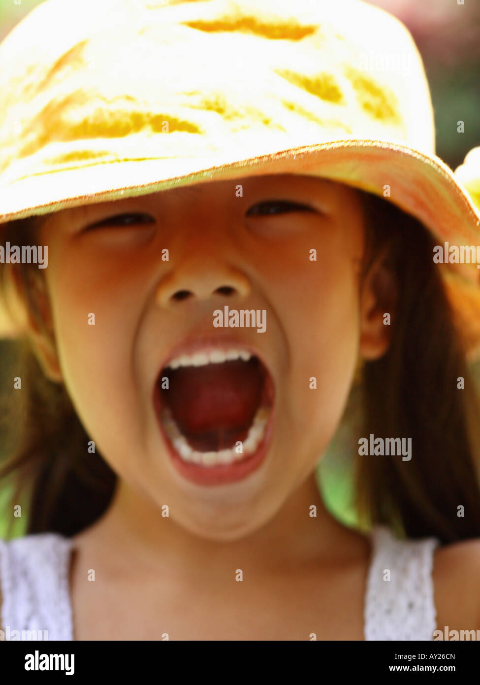 Portrait of a girl shouting Stock Photo - Alamy